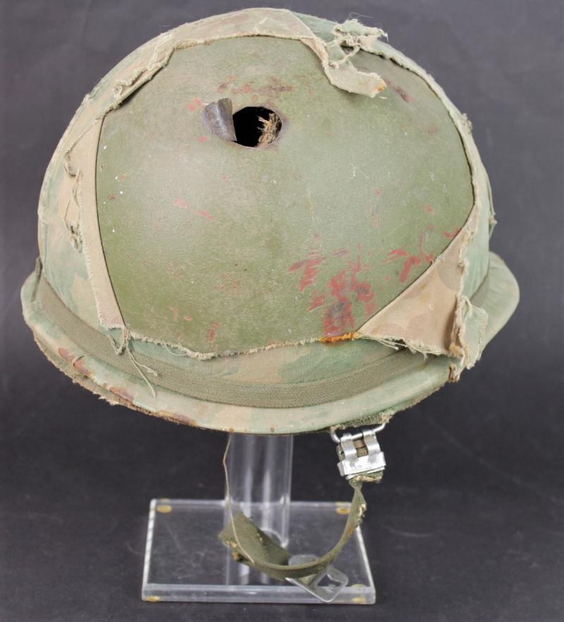 CS Militaria | Battle Damaged US Vietnam Helmet